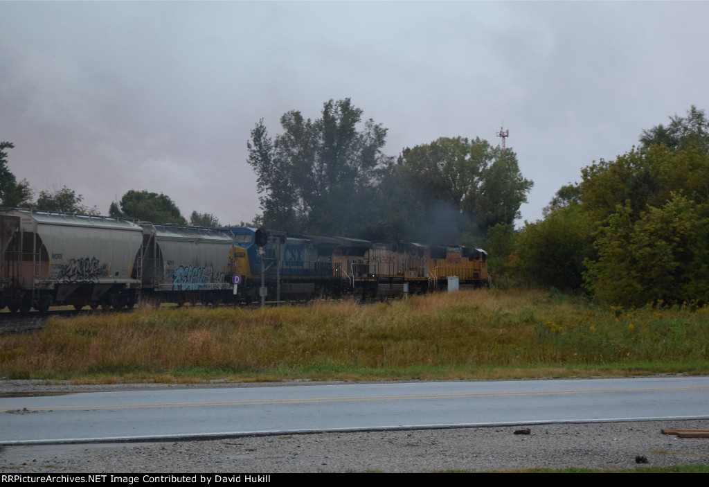 UP Engines 4269 and 7015, and CSX Engine 7818, heading north at high rate of speed, Des Moines
